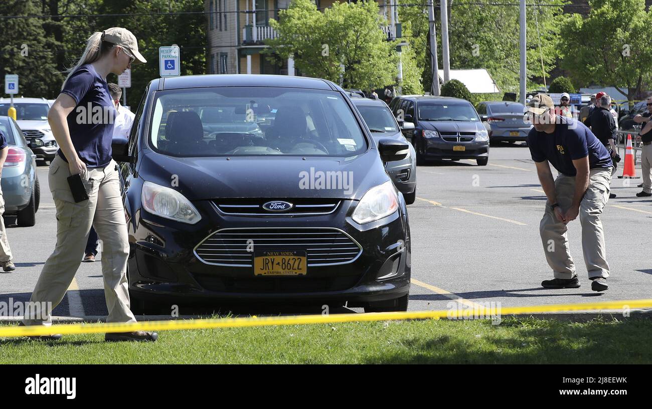 Buffalo, United States. 15th May, 2022. Members of the FBI evidence ...