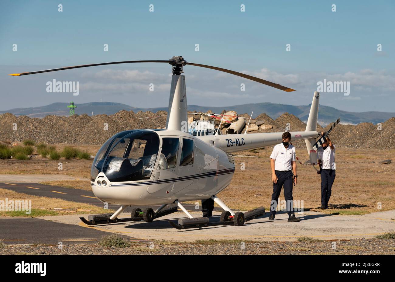 Cape Town South Africa. 2022. Aircrew prepare to move a Robinson ...