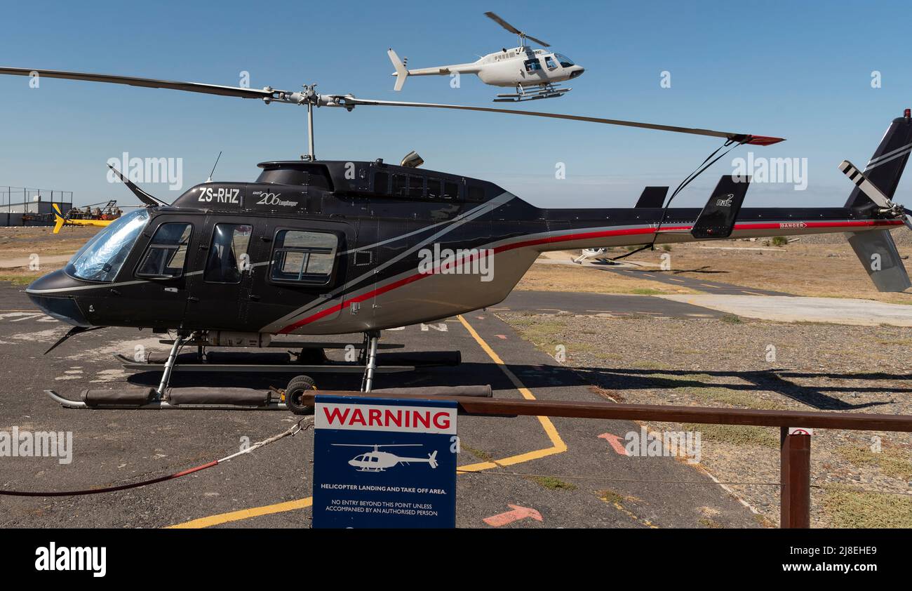 Cape Town, South Africa. 2022. Static helicopter with another flying ...