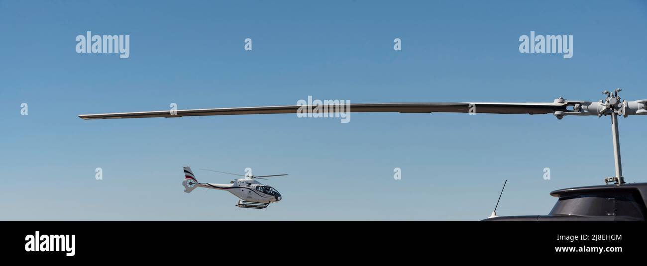 Cape Town, South Africa. 2022. Static helicopter with another flying ...