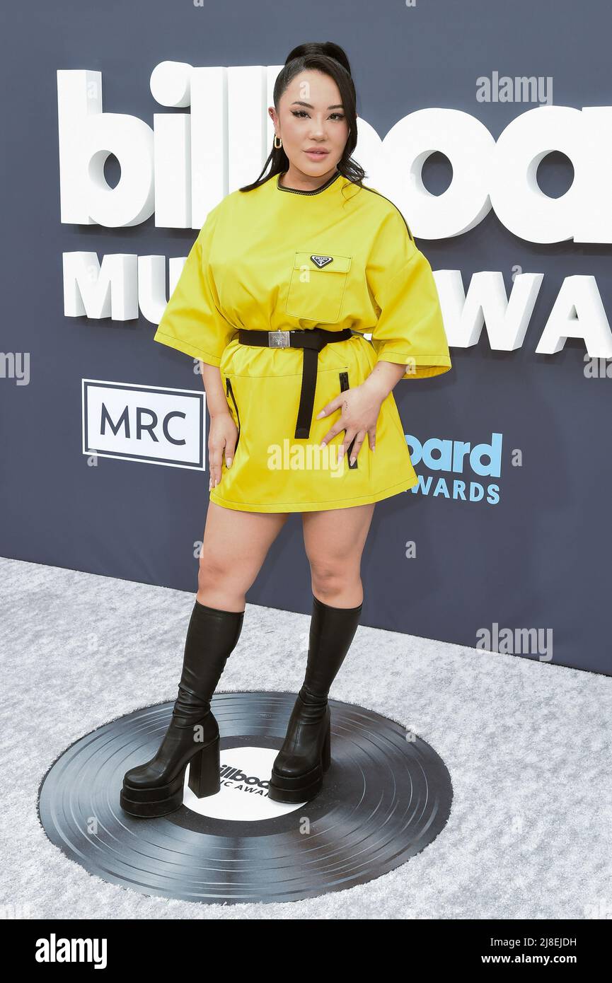 Ashley Yi walking on the red carpet at the 2022 Billboard Music Awards ...