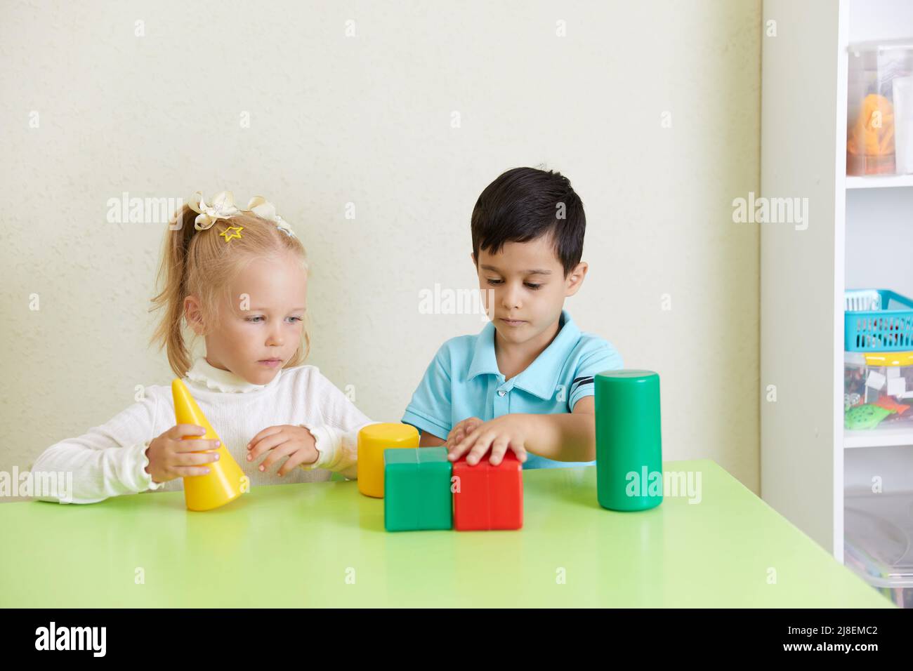 Sad lonely preschool children playing in kindergarten Stock Photo - Alamy