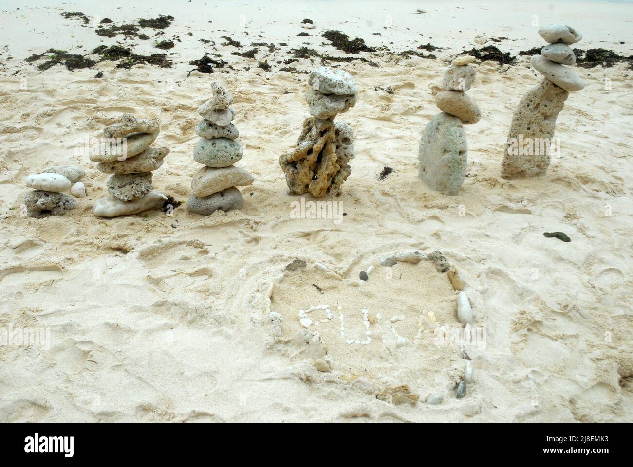 Piles of stones, Puka Shell Beach, Boracay, The Visayas, Philippines ...