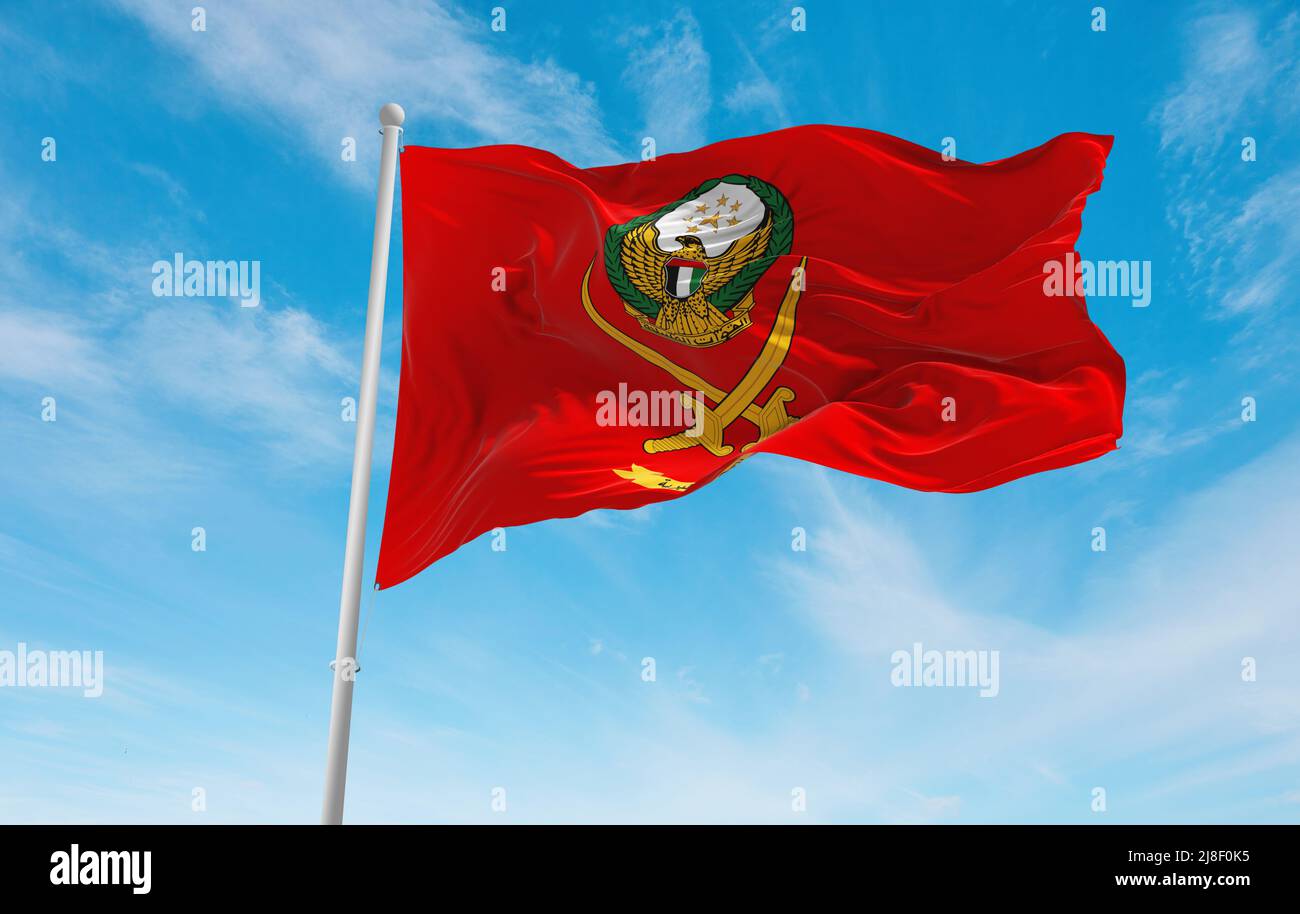official flag of Army , United Arab Emirates at cloudy sky background ...