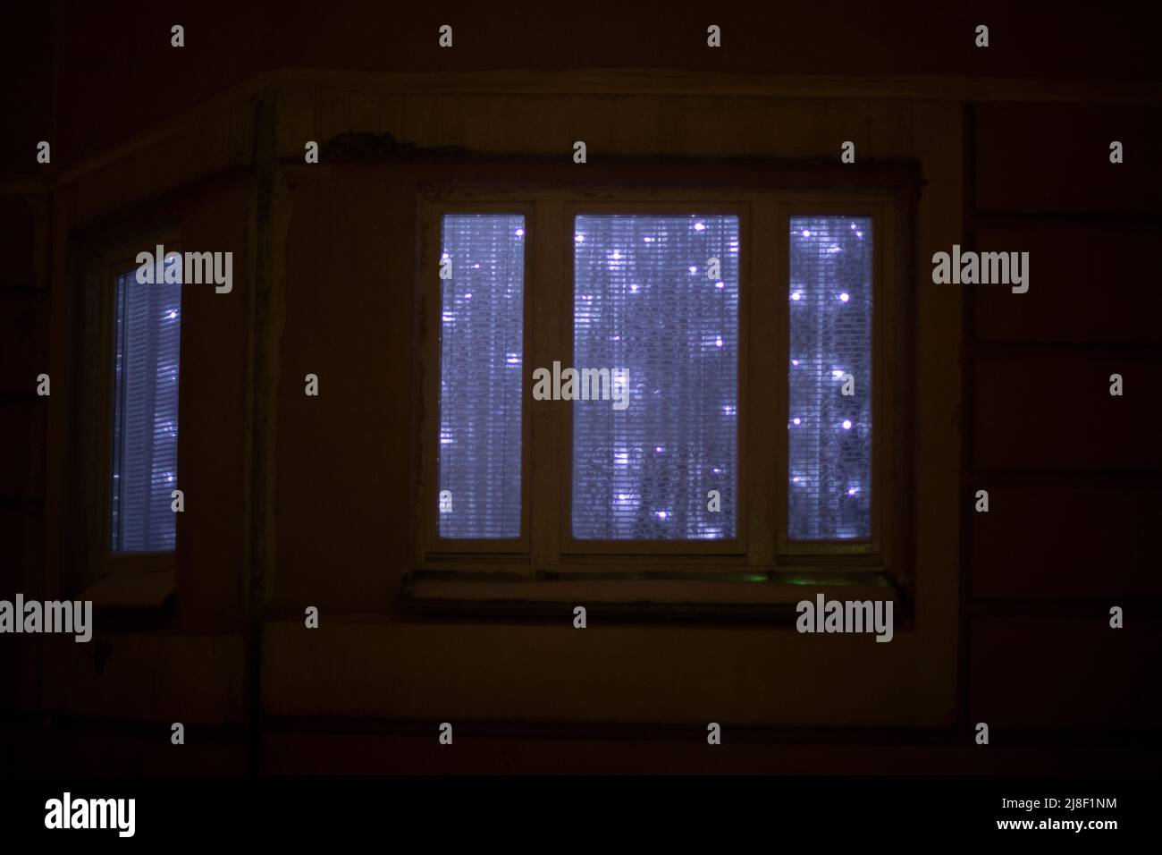 Window is in dark. Light in window. Building is at night Stock Photo ...