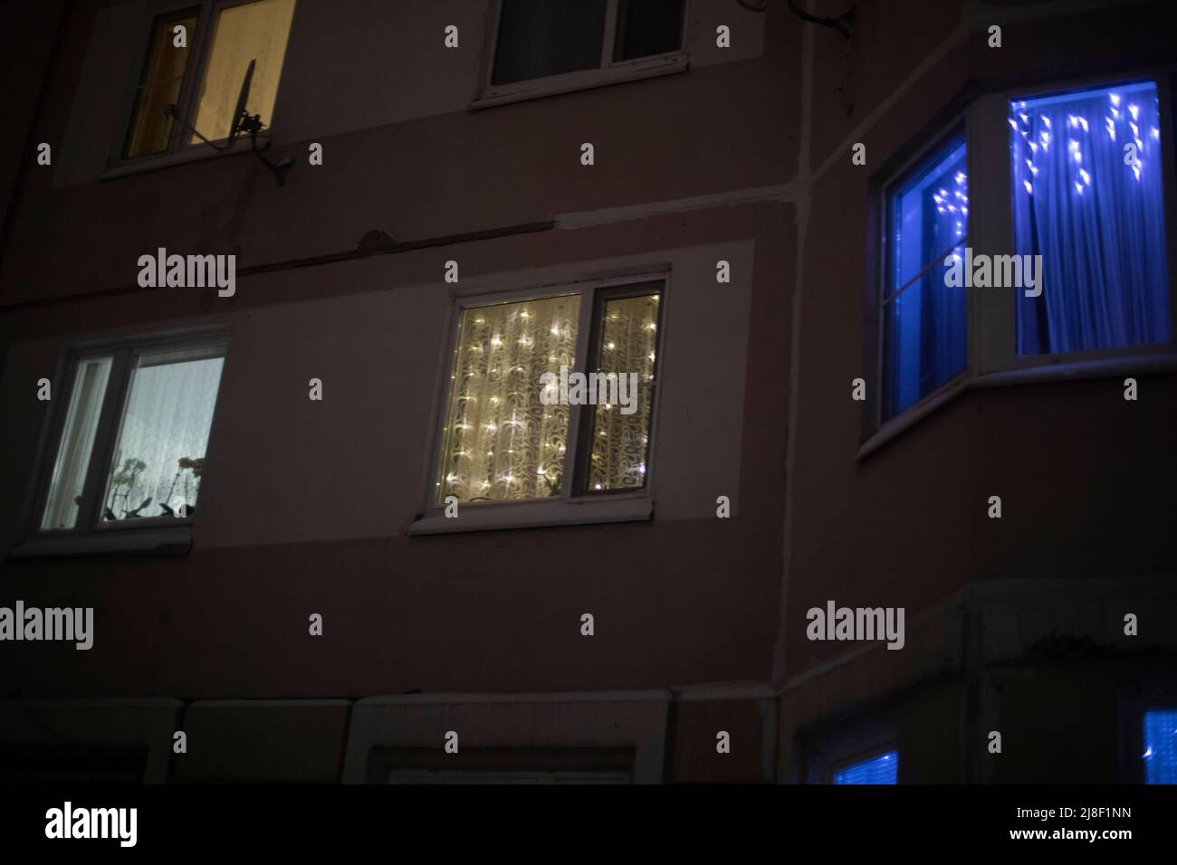 Window is in dark. Light in window. Building is at night Stock Photo ...