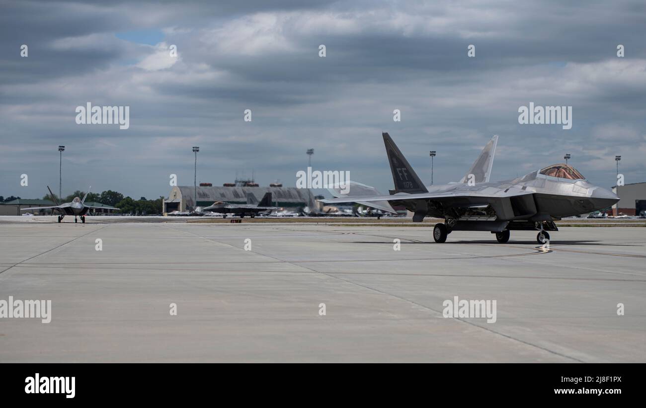 Three U.S. Air Force F-22 Raptors assigned to the 149th Fighter ...