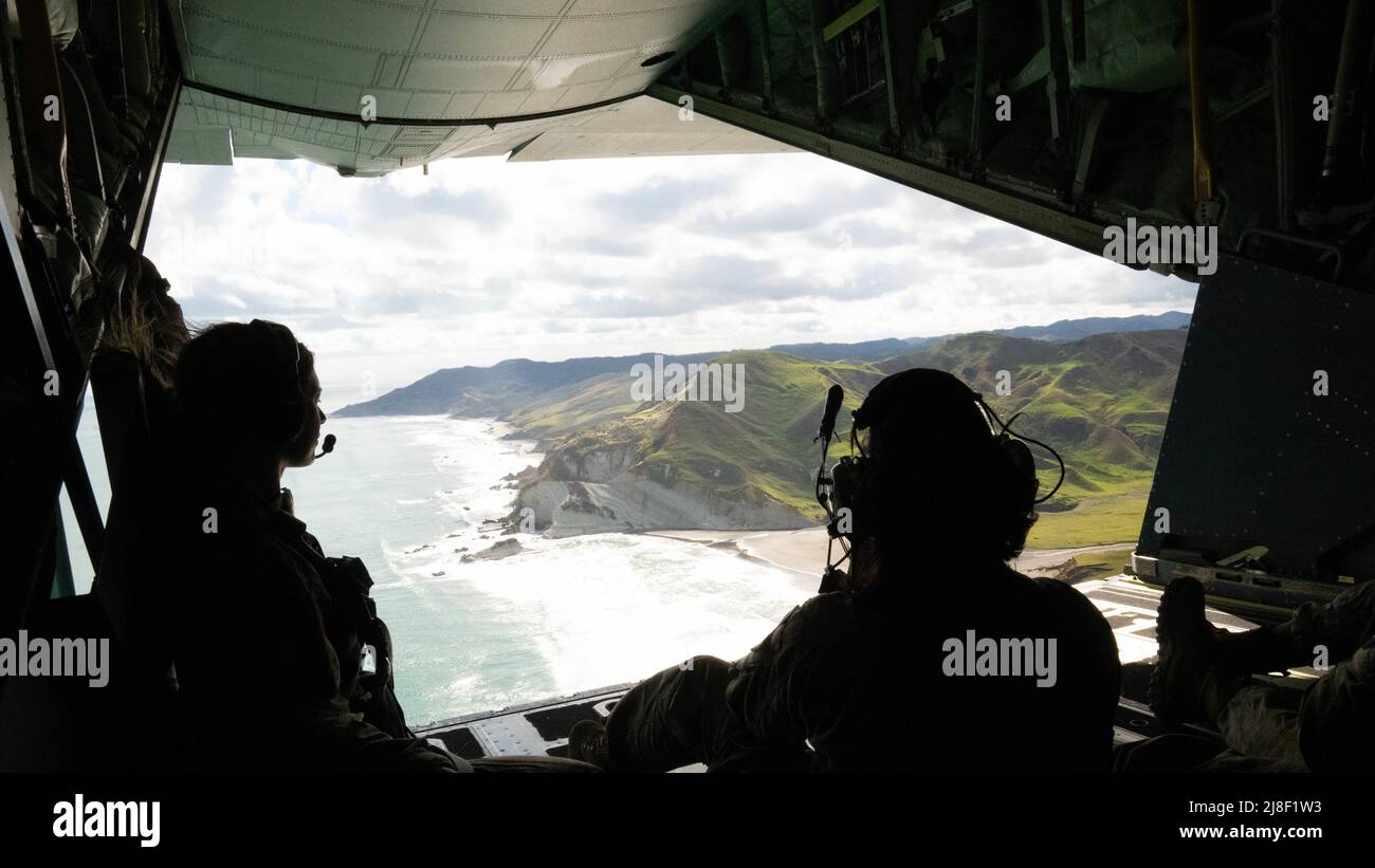 Airmen from the 353d Special Operations Wing observe from the ramp of ...