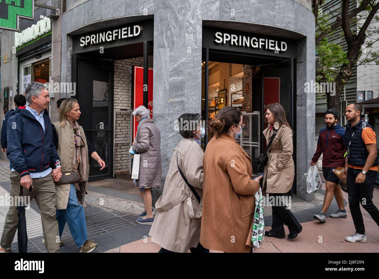 Pedestrians walk past the Spanish fashion retailers brand owned by ...