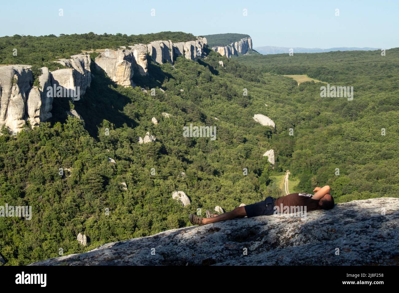 Tourists walk on rocks watch hi-res stock photography and images - Alamy