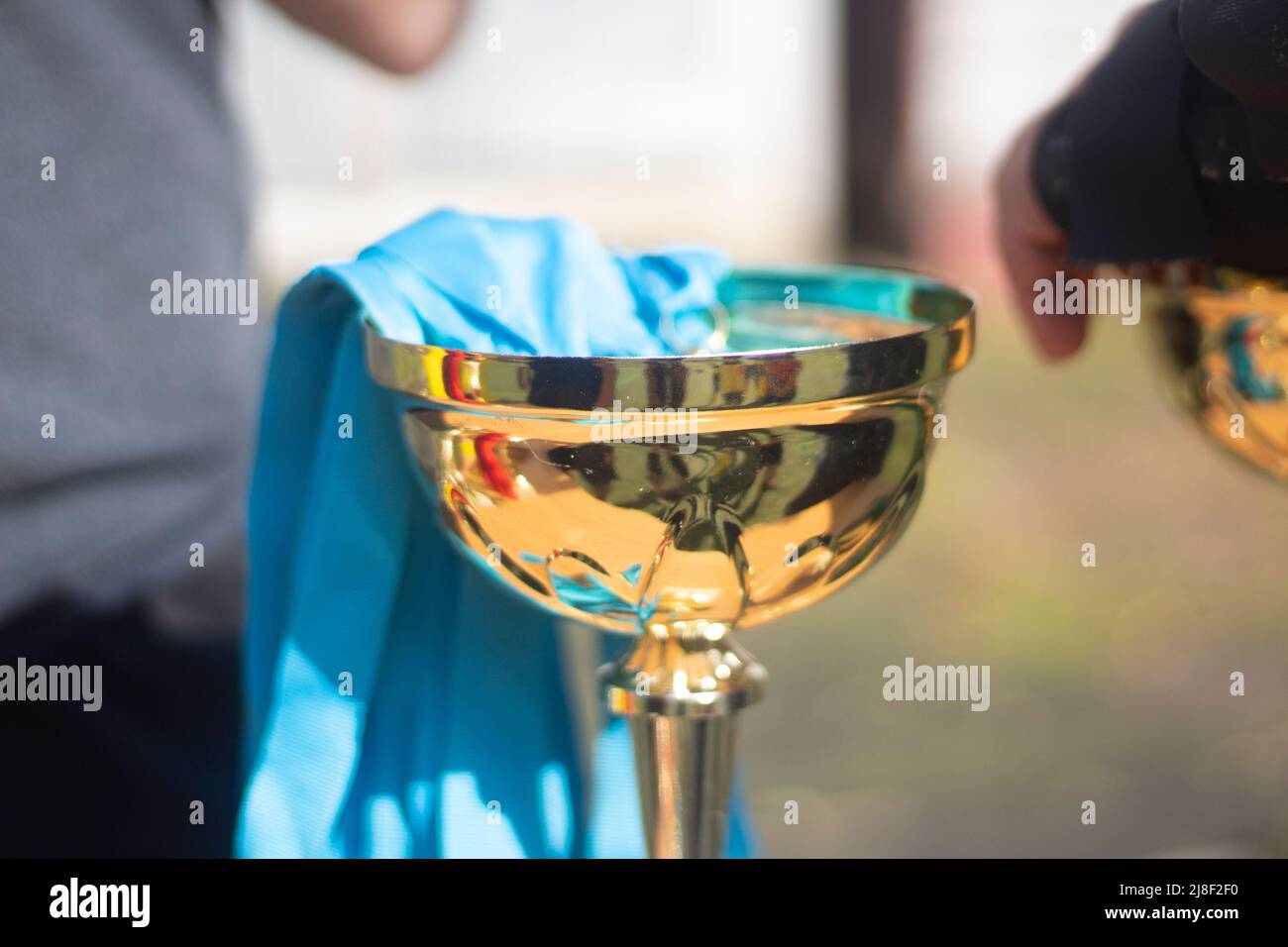 Gold Cups. Sports awards at competition. Details of football match ...