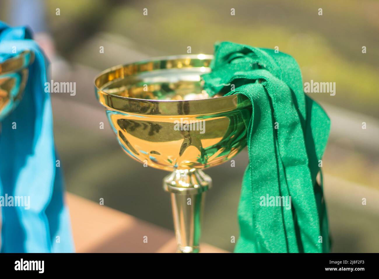 Gold Cups. Sports awards at competition. Details of football match ...