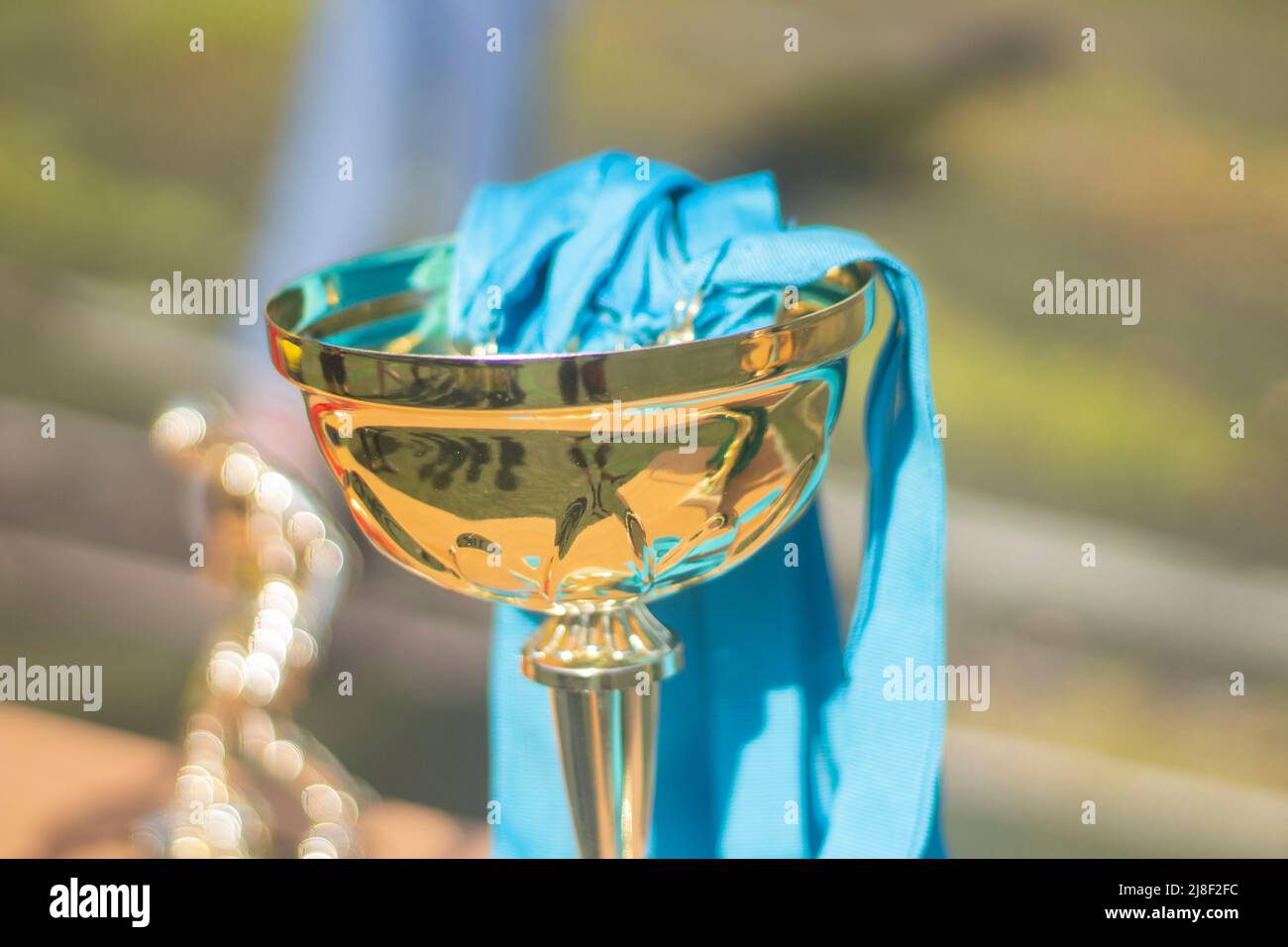 Gold Cups. Sports awards at competition. Details of football match ...