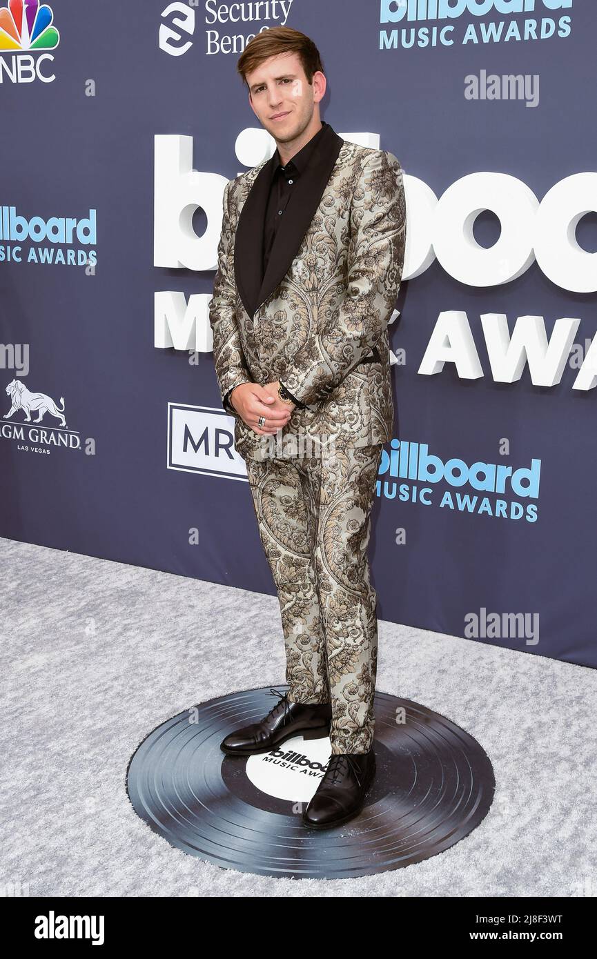 Illenium walking on the red carpet at the 2022 Billboard Music Awards ...