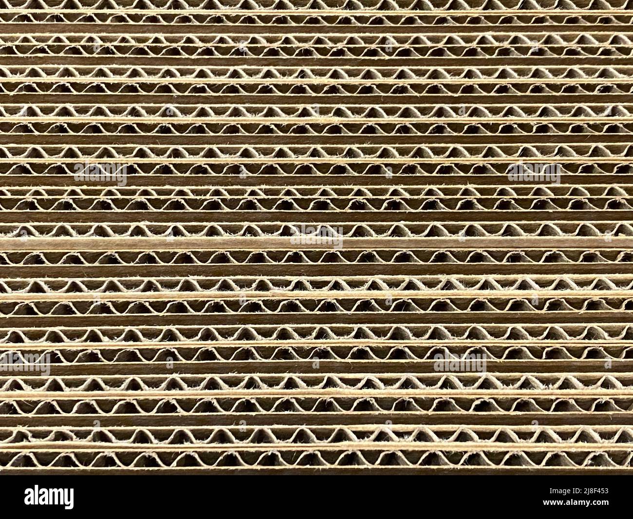 profile view of a stack of carboards flats Stock Photo - Alamy