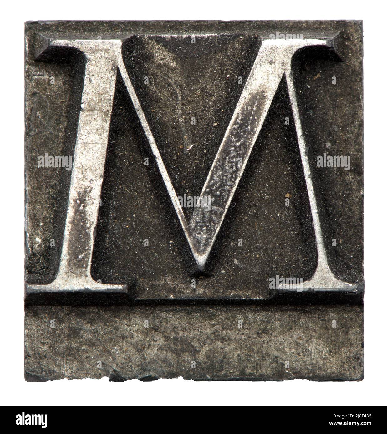 Close-up of metal lead letter uppercase M from a printer font for ...