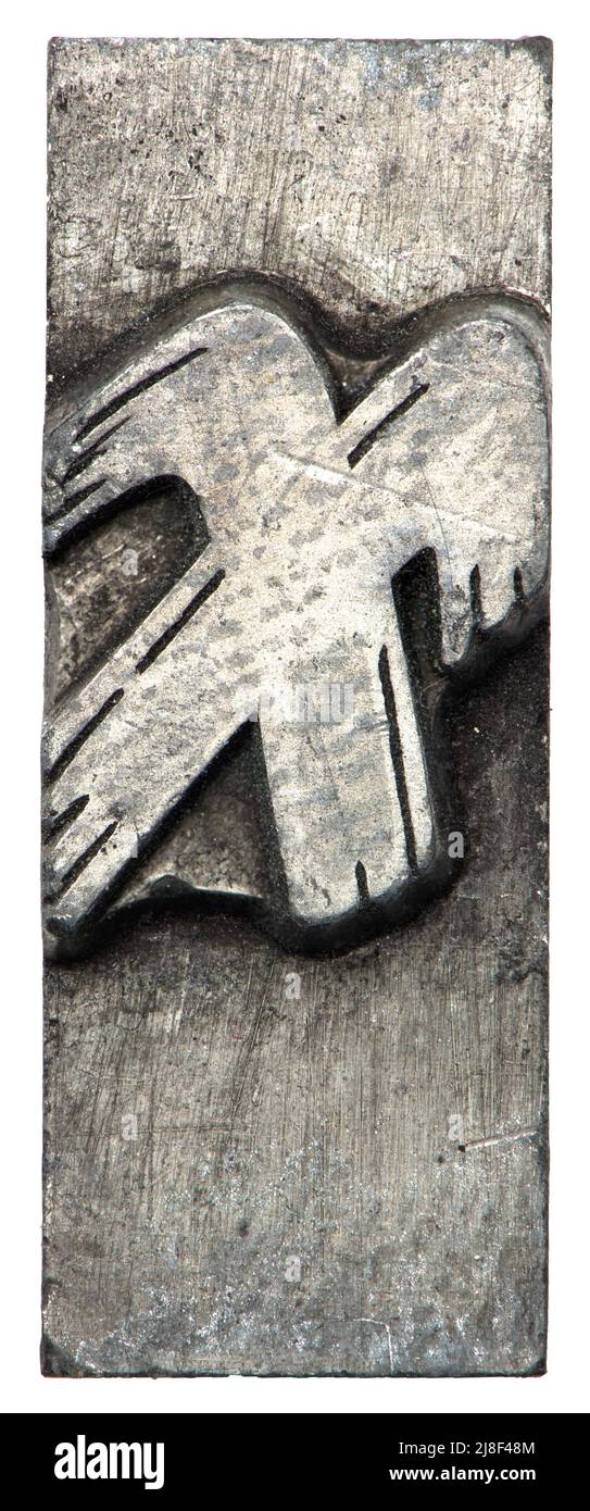 Close up of metal lead letter on white background of lowercase x with ...