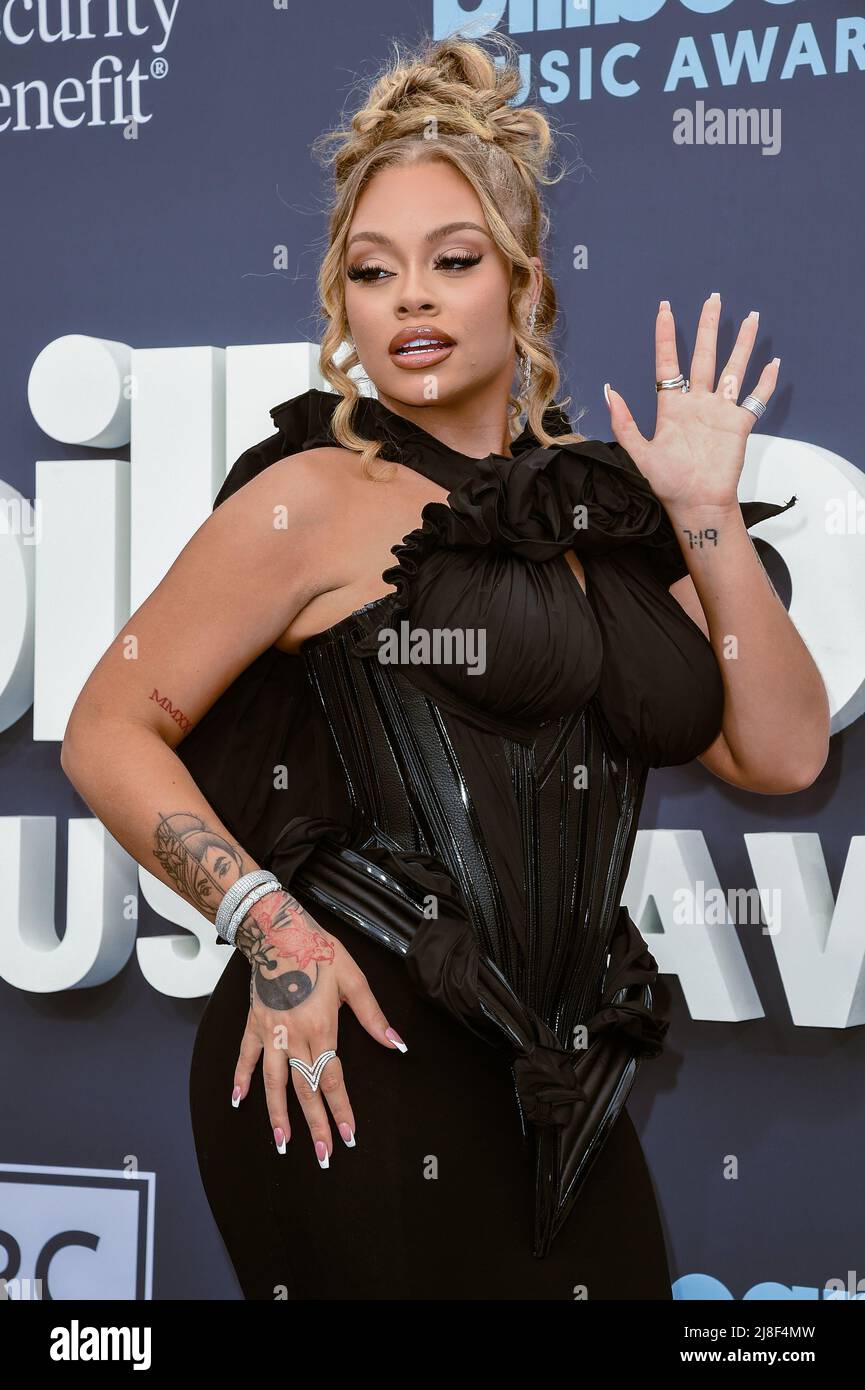 Latto walking on the red carpet at the 2022 Billboard Music Awards at ...
