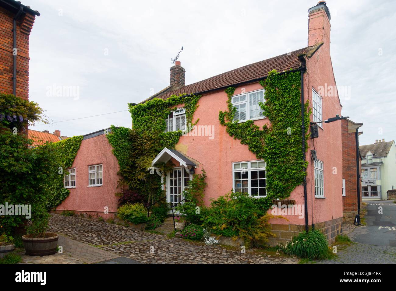 A pink Cottage by the river Leven in the Georgian town of Stokesley ...