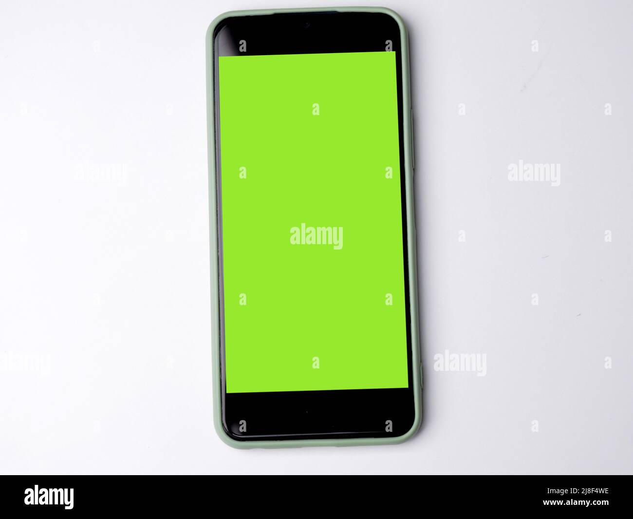 Smartphone With Green Screen And Modern Design Isolated On White