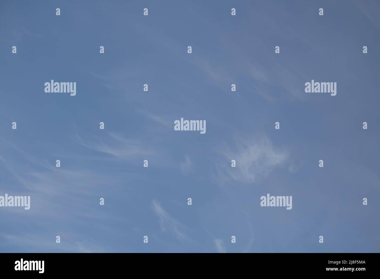 Sky with minimal clouds in daytime Stock Photo - Alamy