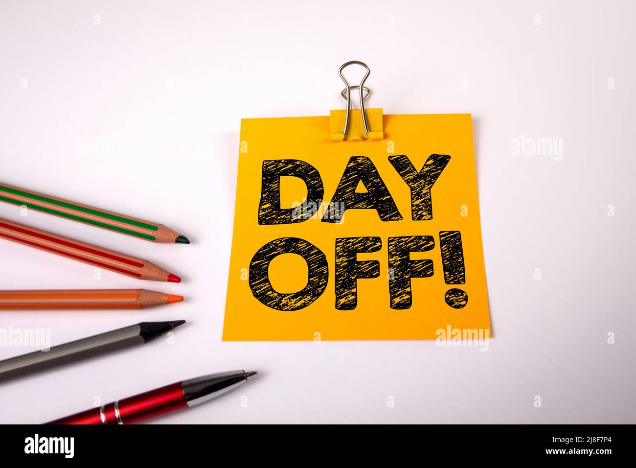 Day Off. Office supplies on a white background Stock Photo - Alamy