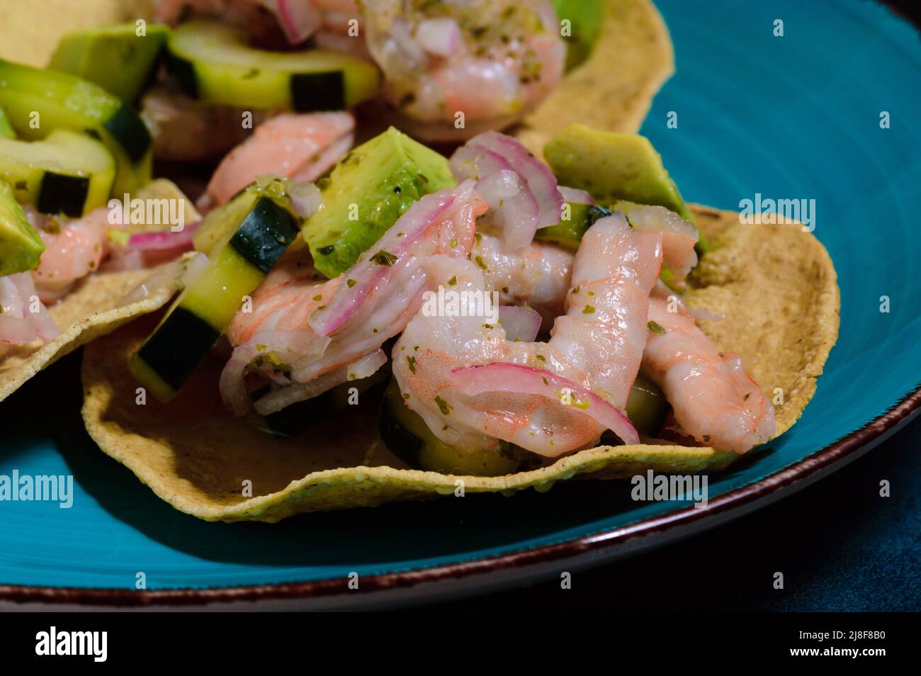 Aguachile, Mexican spicy marinated seafood dish with shrimp Stock Photo ...