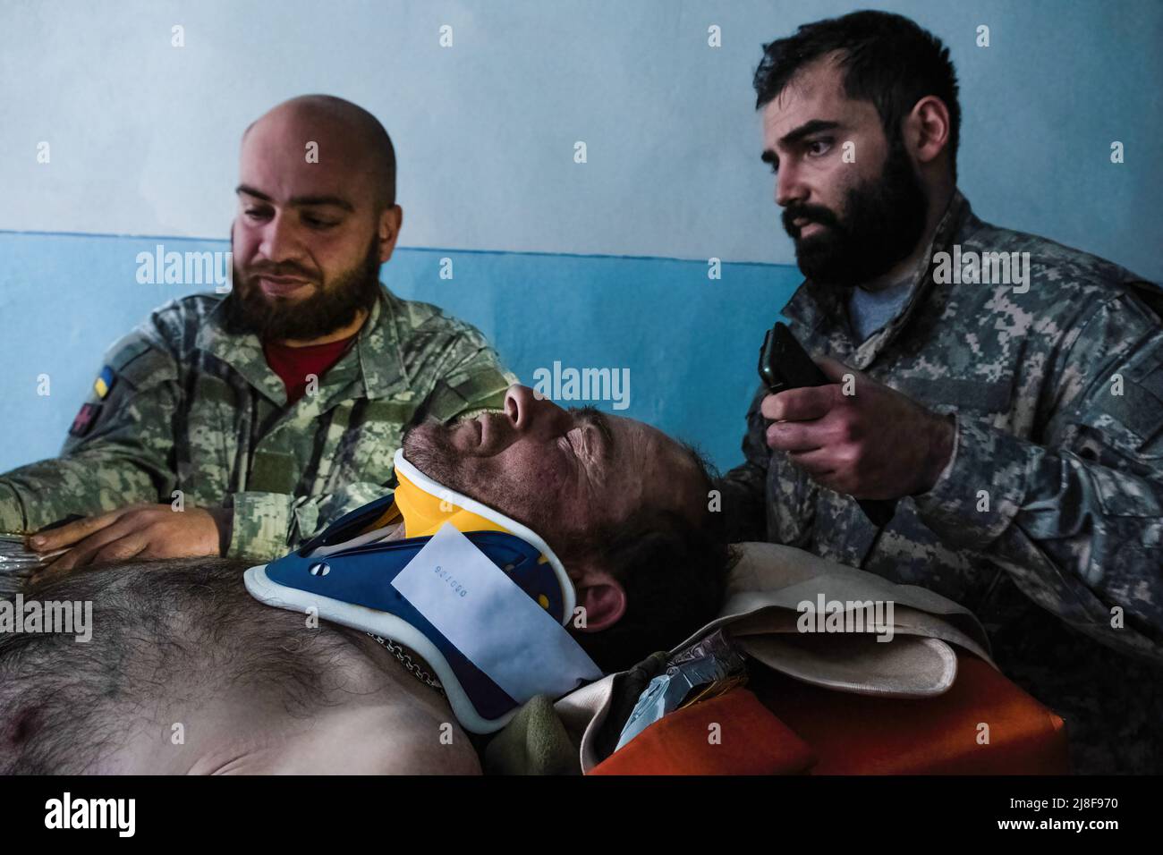 A soldier who suffered concussion and spinal trauma is visited by a ...