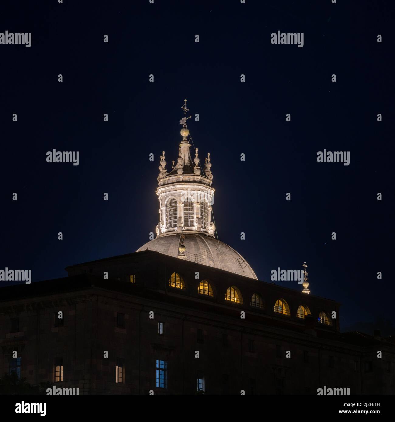 Loiola, Spain - 5 May, 2022: nighttime view of the illuminated cupola ...