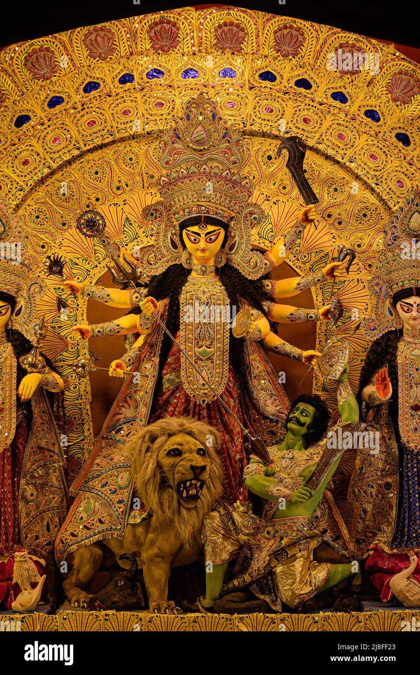 Goddess Durga devi idol decorated at puja pandal in Kolkata, West Bengal, India. Durga Puja is ...