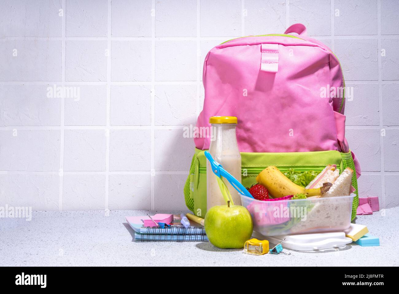Healthy school lunch box: sandwich, vegetables, fruit, nuts and yogurt ...