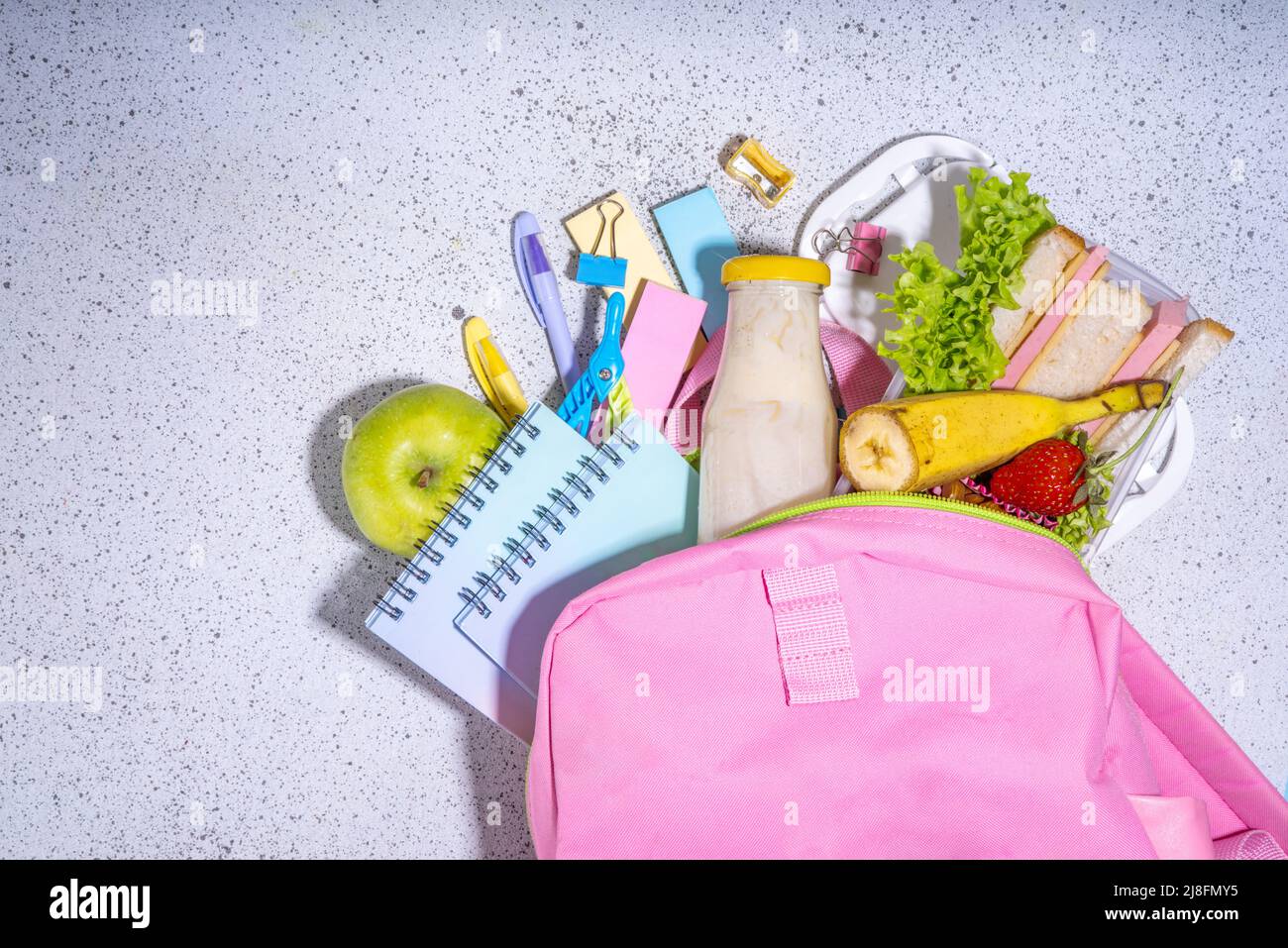 Healthy school lunch box: sandwich, vegetables, fruit, nuts and yogurt ...