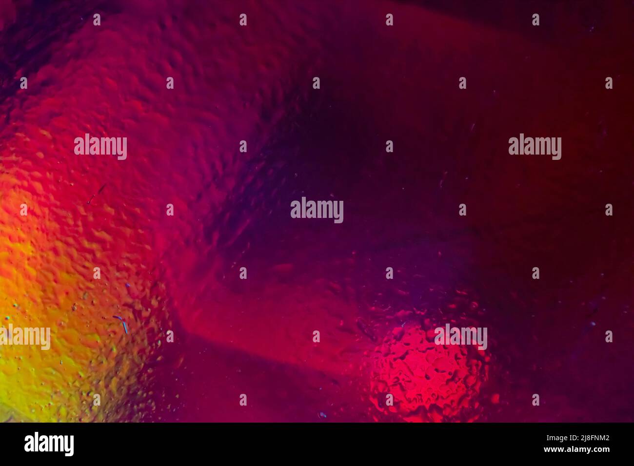 Abstract red background with bubbles. Glossy wet surface. Abstract ...