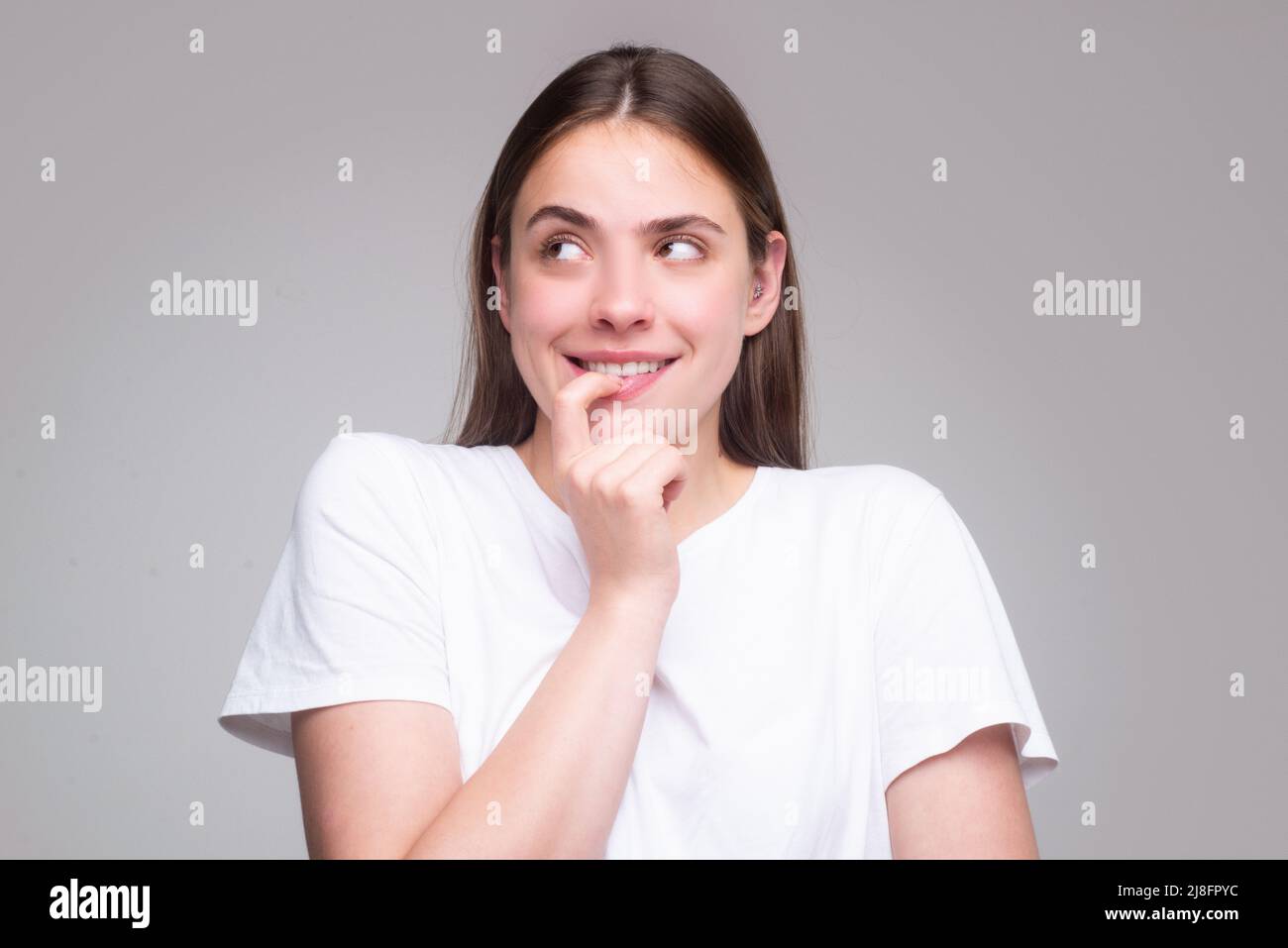 Girl shrugging shoulders hi-res stock photography and images - Alamy