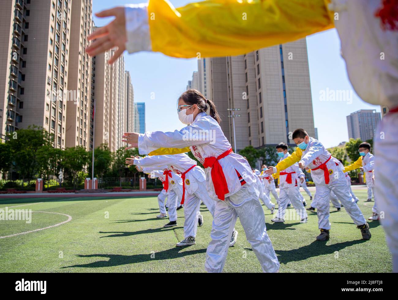 HOHHOT, CHINA - MAY 16, 2022 - Pupils practice "Wu Qin Xi" during a ...