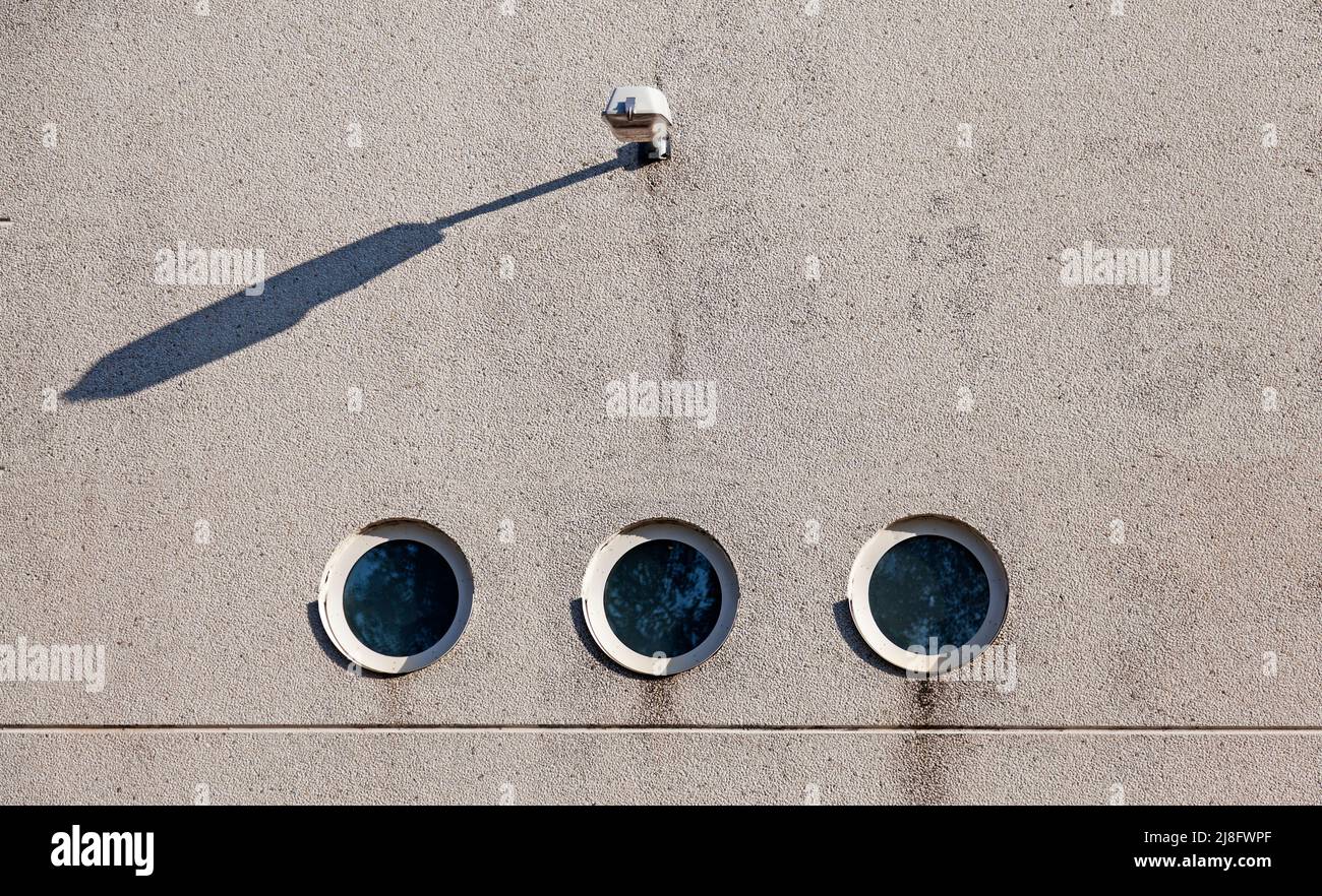 Concrete wall round windows hi-res stock photography and images - Alamy