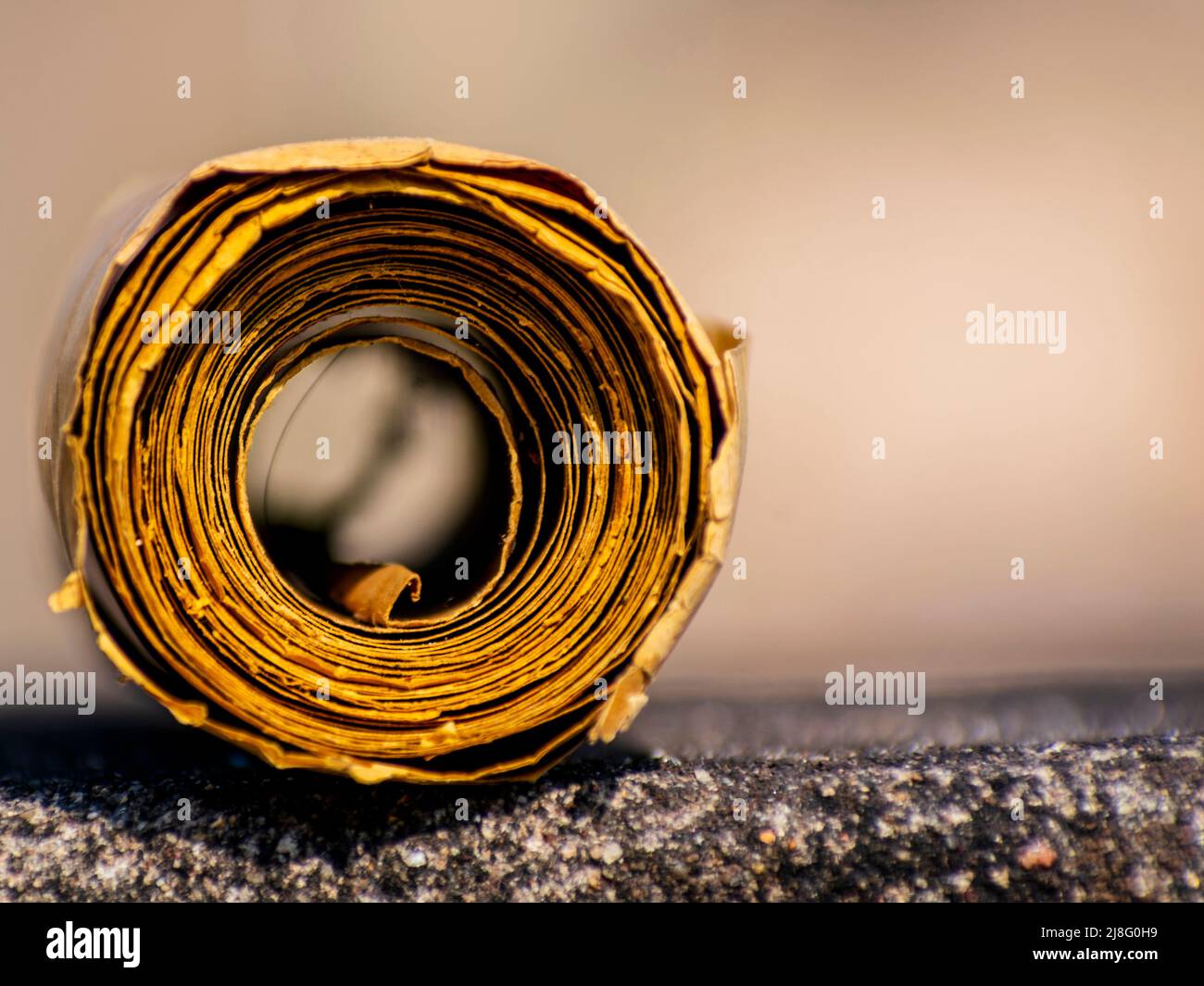 Rolled up old paper hi-res stock photography and images - Alamy