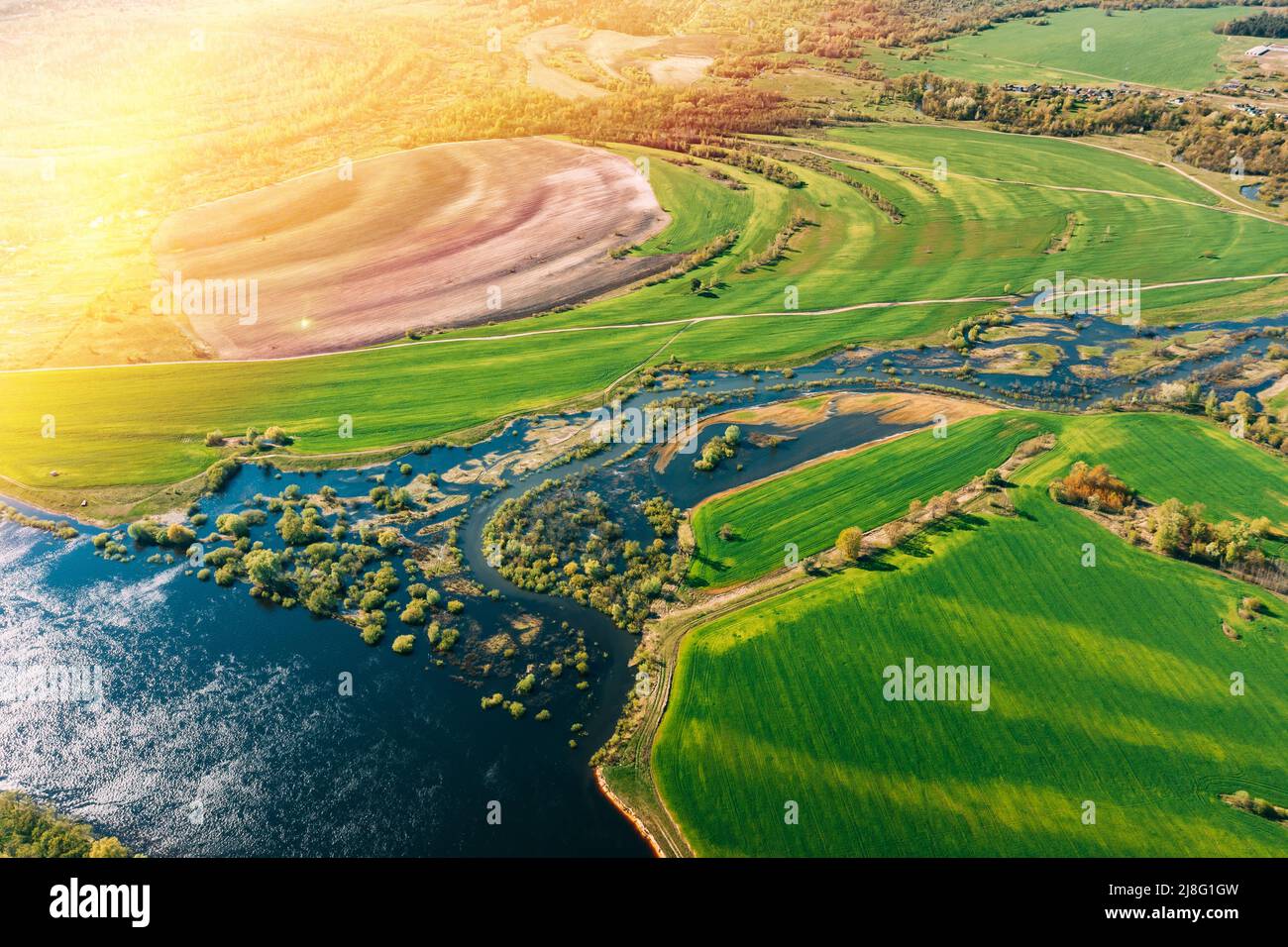 Aerial View Green meadows And River Landscape In Sunny Spring Summer ...
