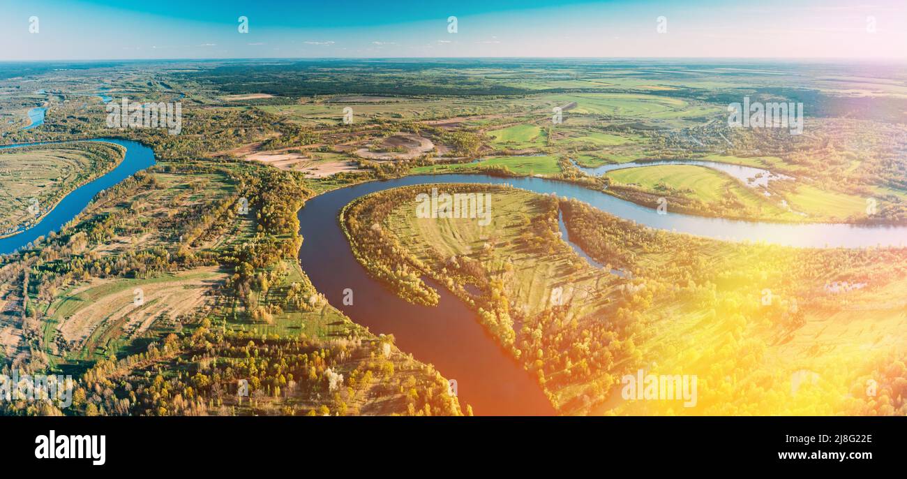 Aerial View Green Forest Woods And River Landscape In Sunny Spring ...