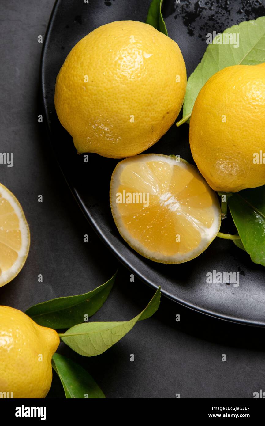 Group fresh lemons leaves hi-res stock photography and images - Alamy