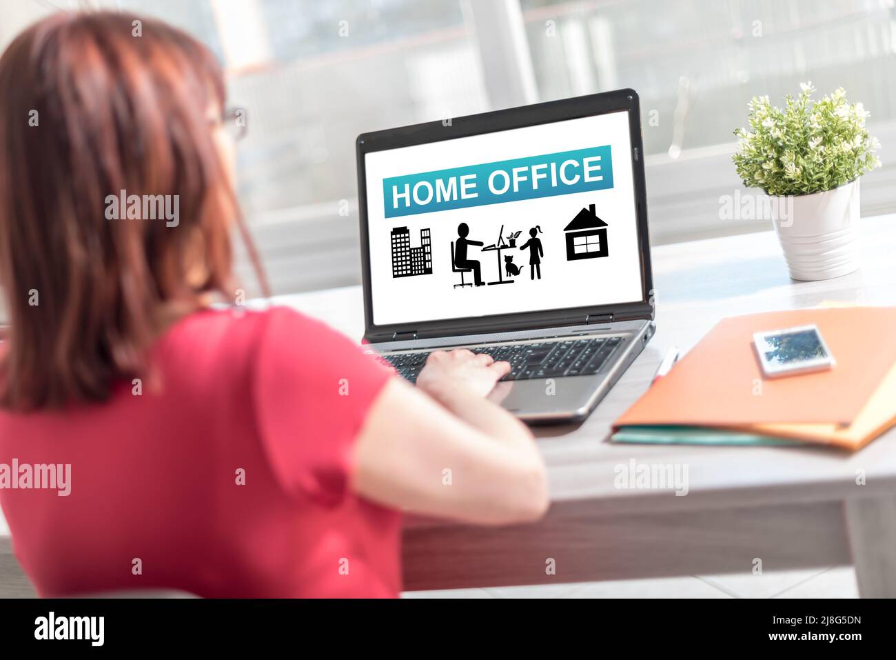 Laptop screen displaying a home office concept Stock Photo - Alamy