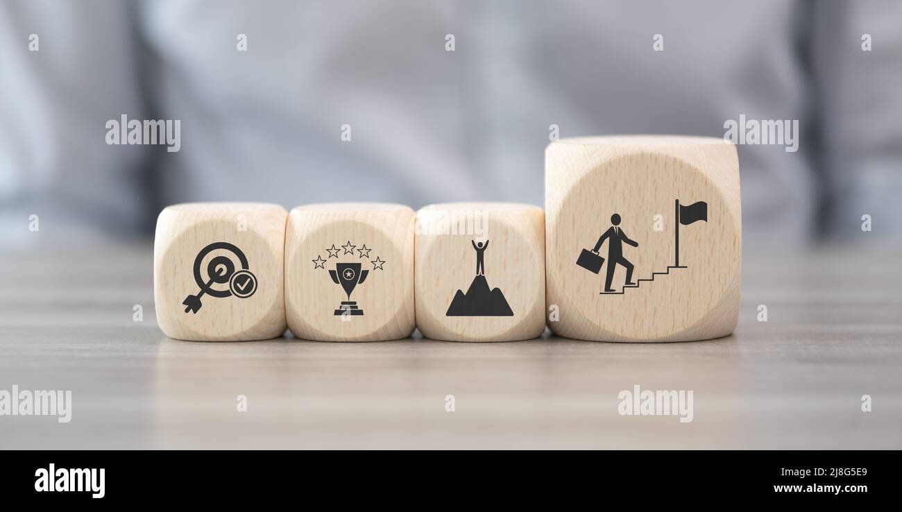 Wooden blocks with symbol of goals concept Stock Photo - Alamy