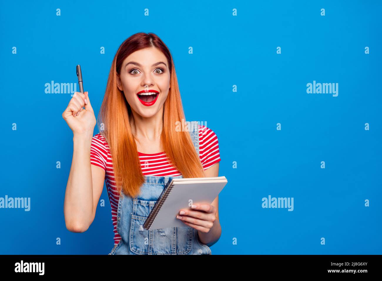Photo of adorable smart young lady dressed denim clothes rising pen ...