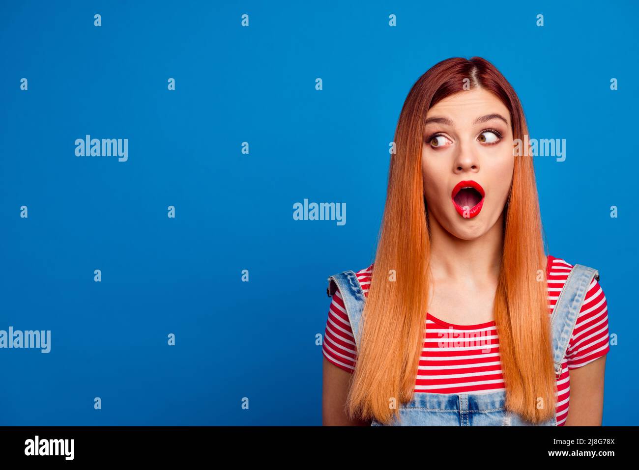 Photo of astonished pretty girl open mouth look interested empty space ...