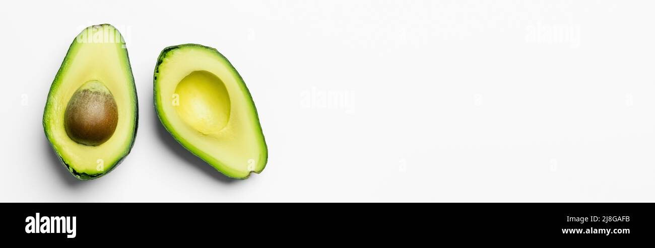 Top view of fresh cut avocado on white background with copy space ...