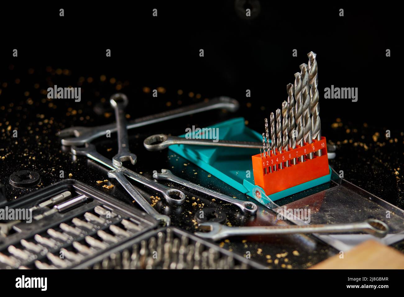 A box of metal steel heads and bits with different types for ...