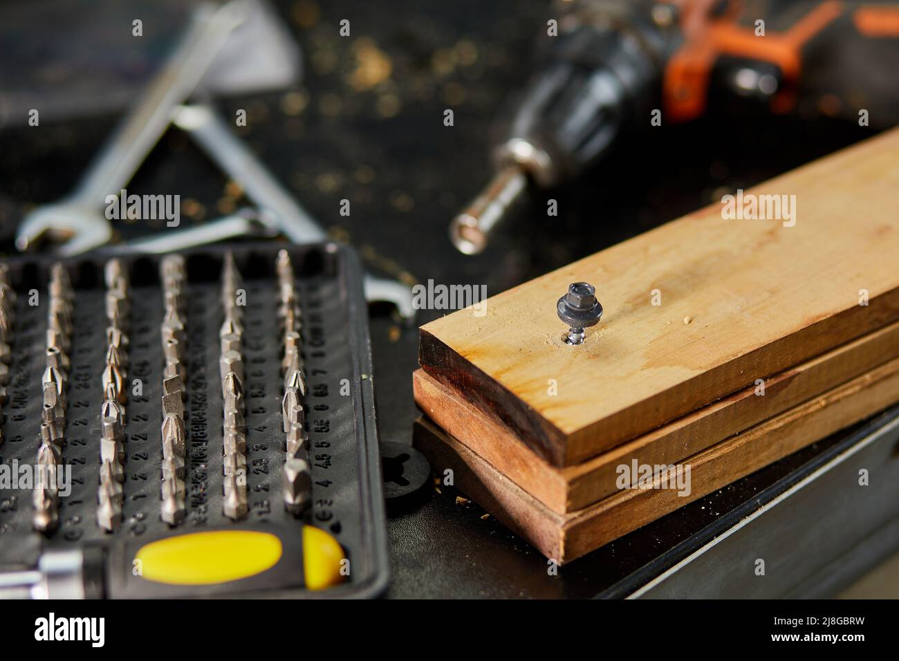 A box of metal steel heads and bits with different types for ...
