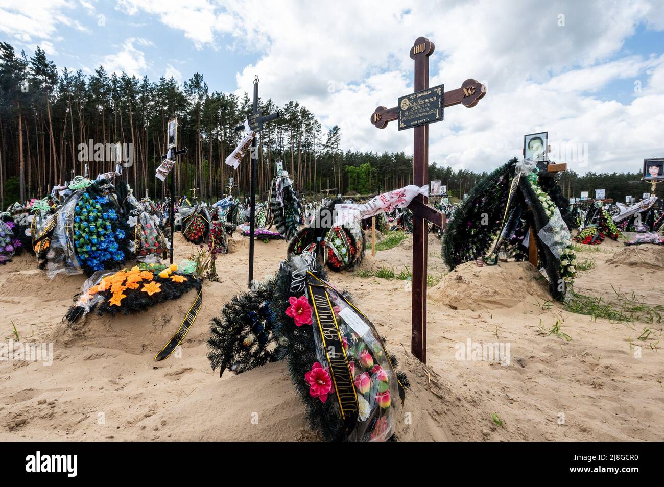 A graveyard with people buried who died during the occupation of Bucha ...
