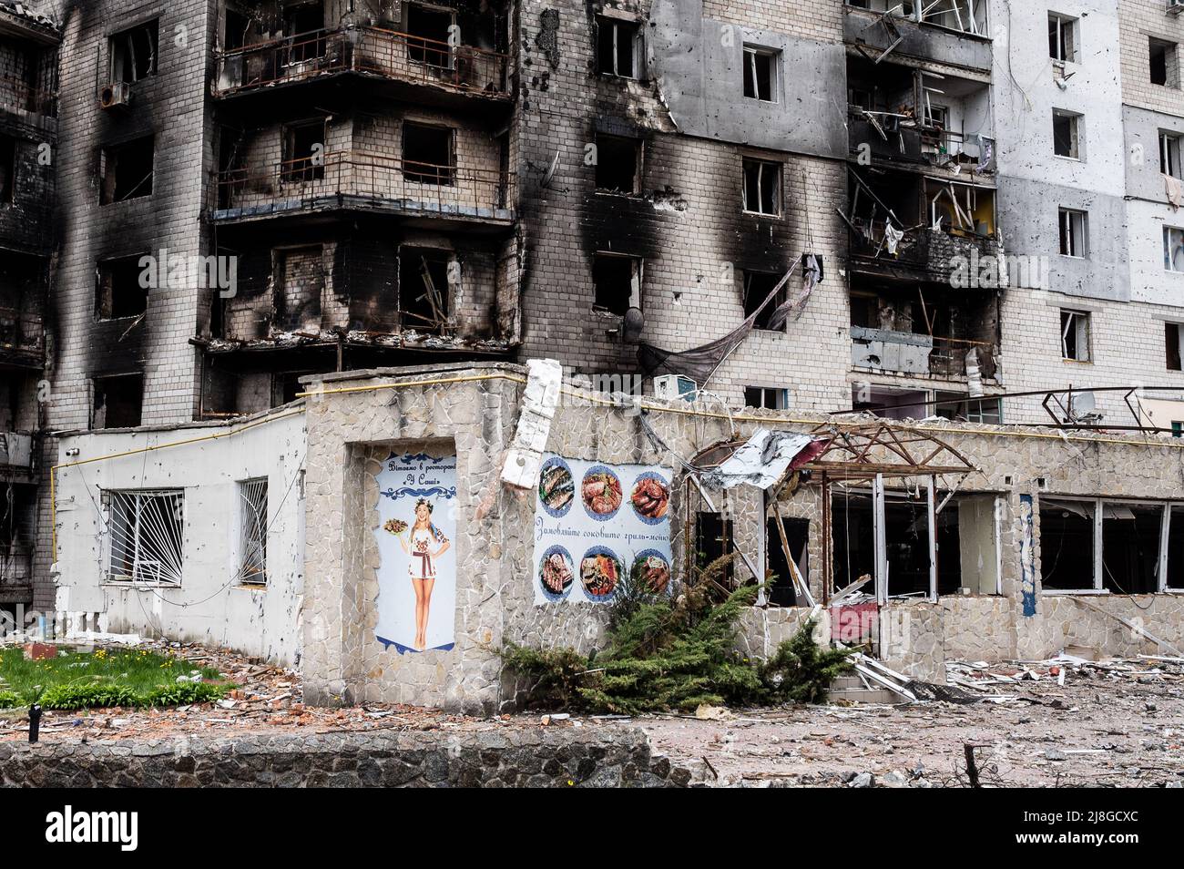 A building destroyed by the Russian military with a restaurant on the ...
