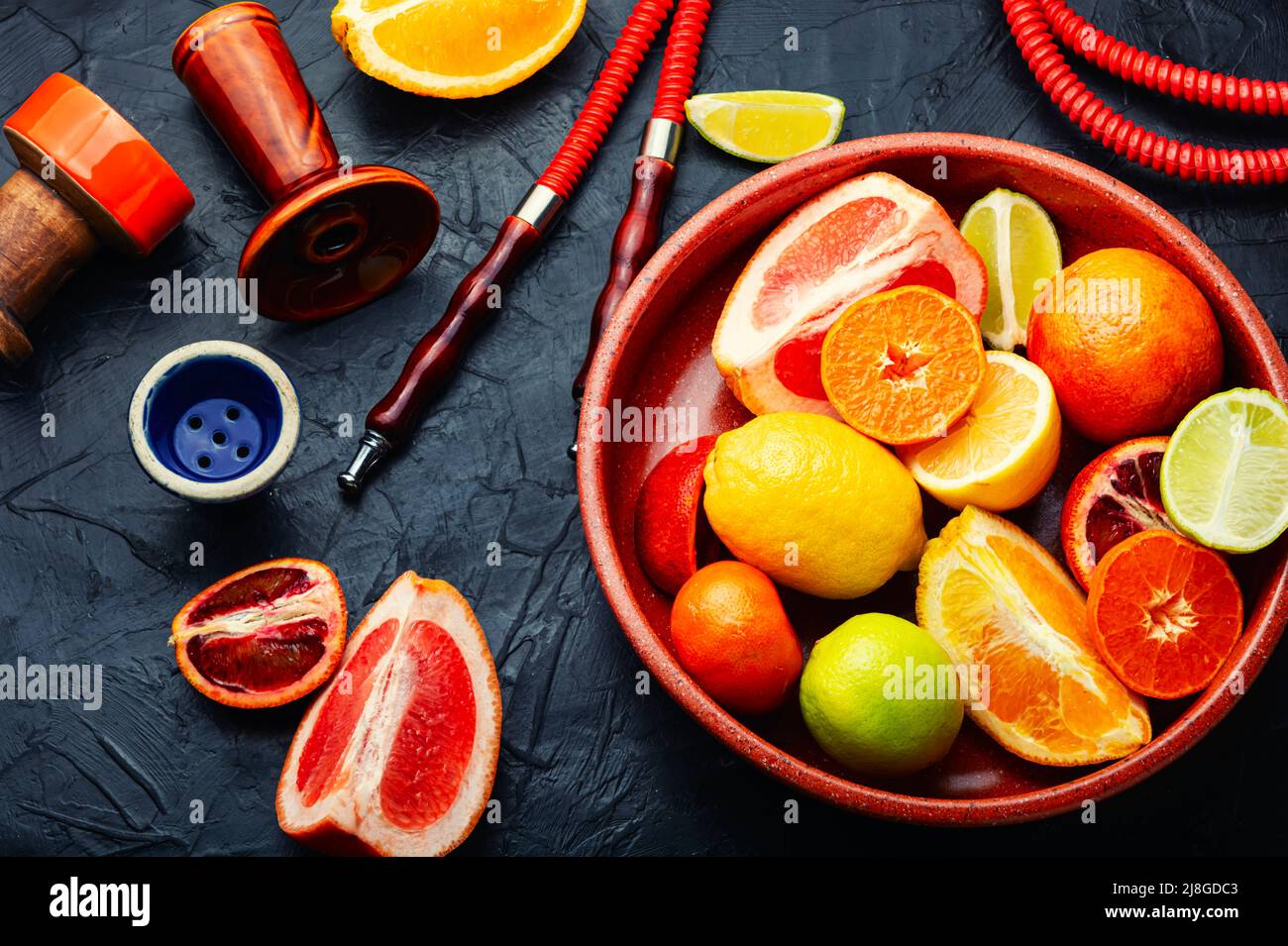 Fragrant smoking hookah or shisha with tobacco from citrus fruits Stock ...